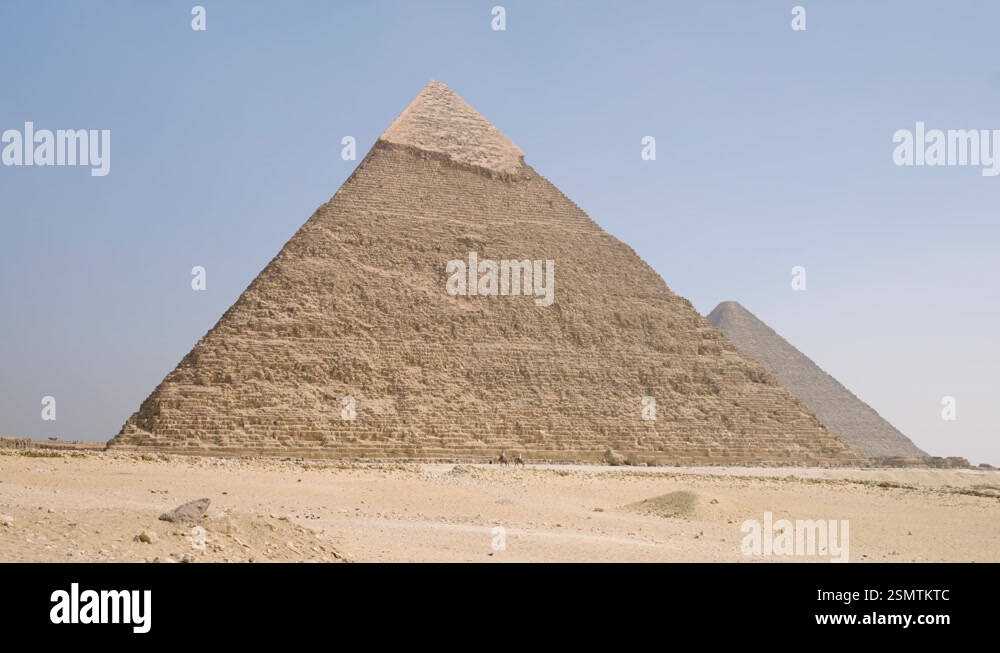 Giza Plateau Pyramid With Blue Sky Backdrop In Giza, Egypt. Static Shot ...