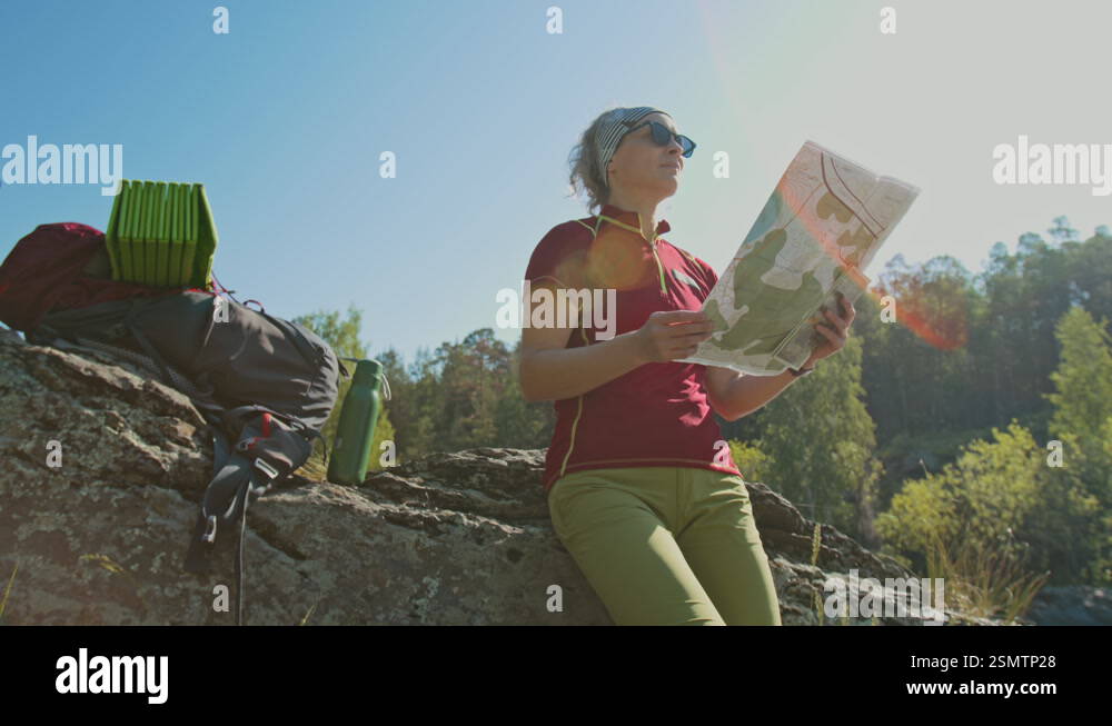 Map exploring Stock Videos & Footage - HD and 4K Video Clips - Alamy