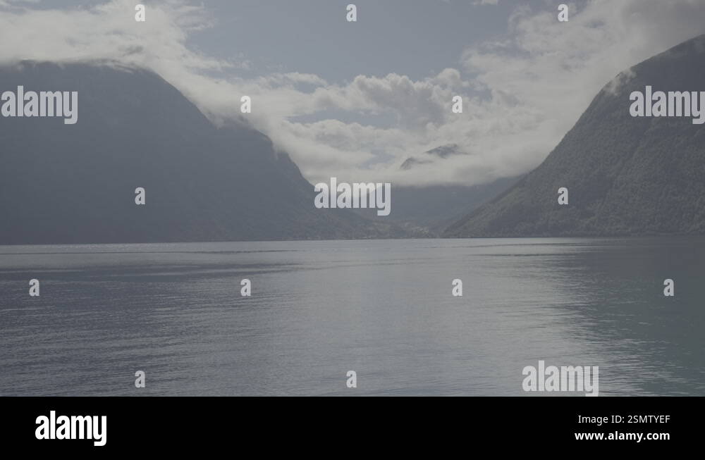 travel shot going sideways filmed from a car Ferry crossing the Fjord ...