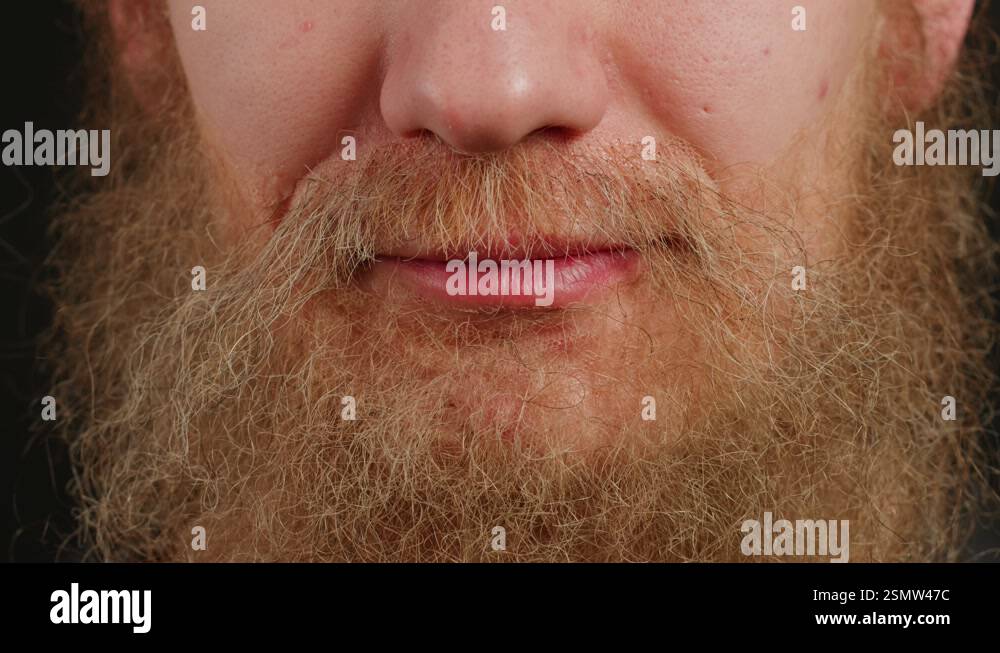 Make up artist making Disheveled blond beard for a man in theater with ...
