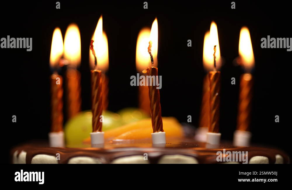 Birthday cake with lit candles, spinning slowly Stock Video Footage - Alamy