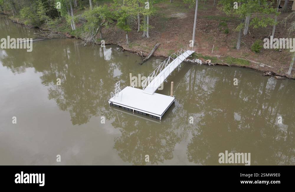 Empty boat dock on the lake. Circle clockwise shot. Lake Murray in ...