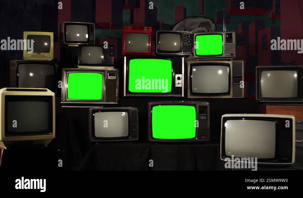 Vintage TV Stack: Nine Green Screens Power On Among 80s and 90s Sets ...