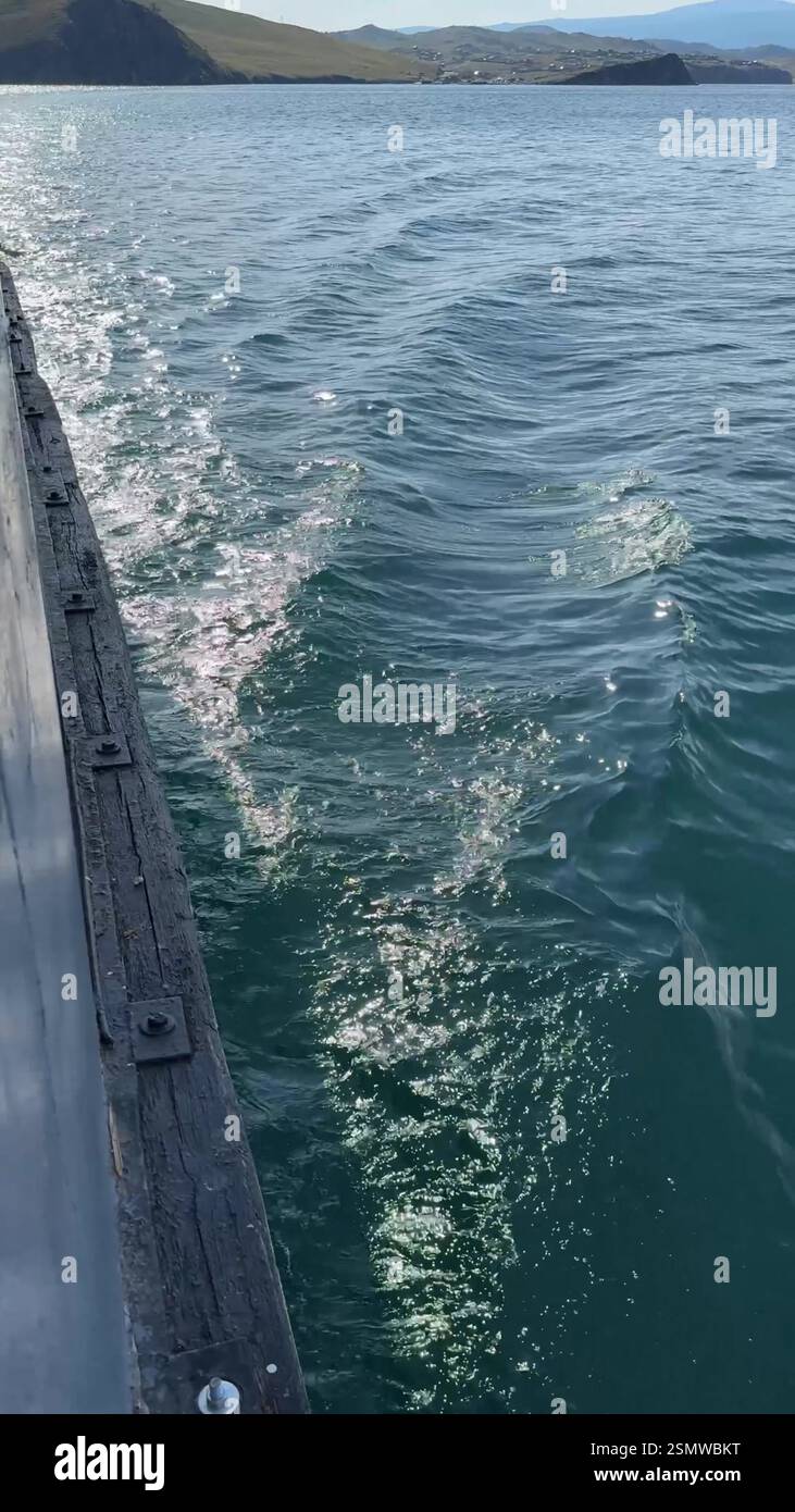 Waves on the water from the movement of the boat. Ship waves. 4K ...