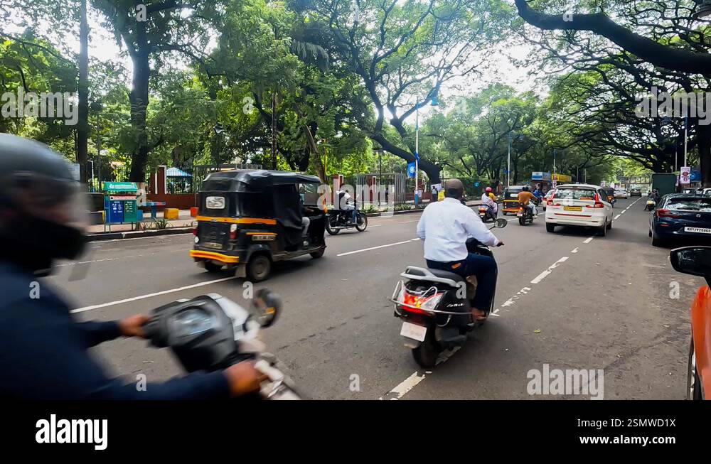 Traffic of Motorcycles and Cars in Pune City, India Stock Video Footage ...
