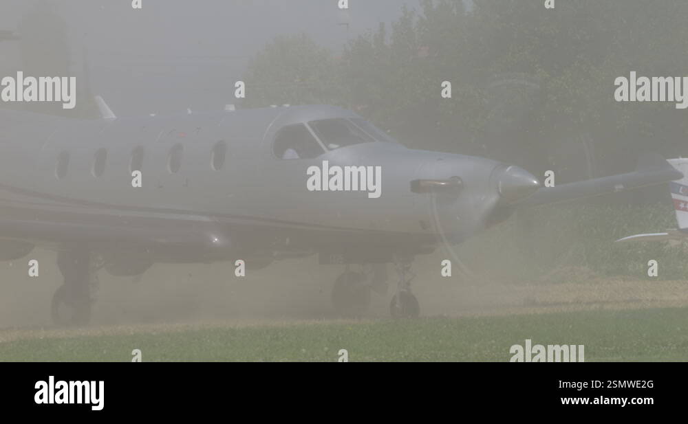 VIP Turboprop Aircraft Parking on Dusty Remote Airstrip Stock Video ...