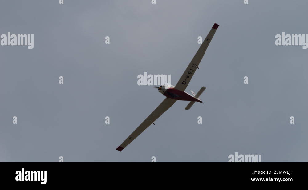 Vintage Wood and Fabric Motor Glider in Graceful Flight. Close-Up from ...