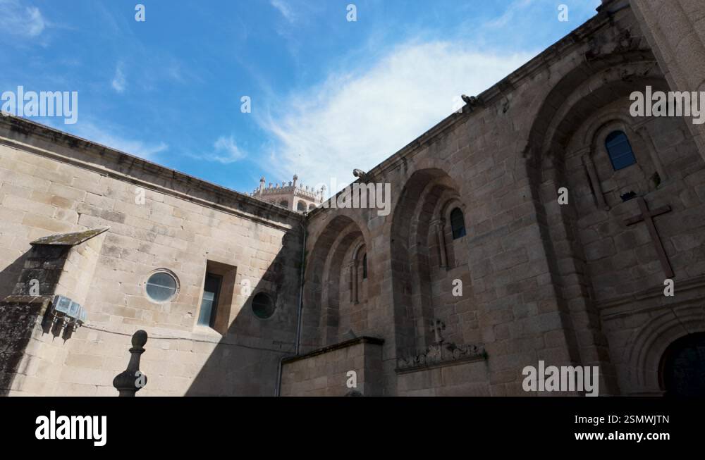 Exterior establish pan across outdoor brick walls of Cathedral of San ...
