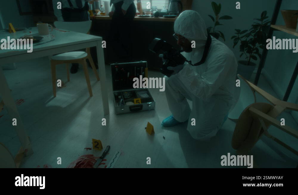Forensic Photographer in Protective Uniform Capturing Images of Blood ...