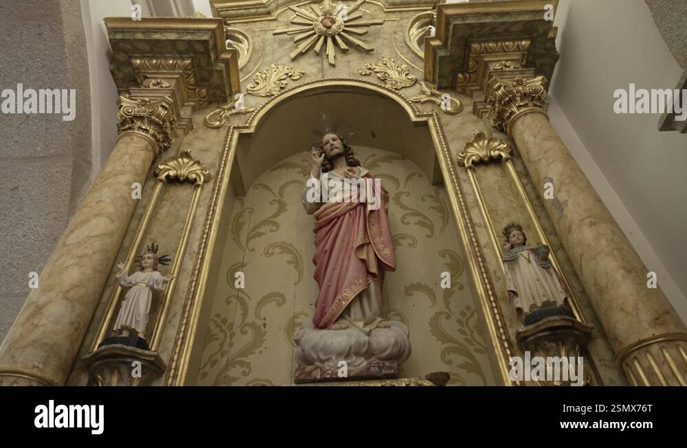 ornate religious statue of jesus in a gilded alcove with intricate ...
