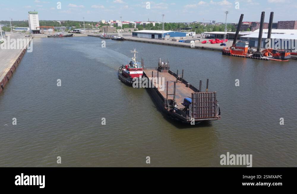 Turku, Finland - 05/28/2024: Idäntie tug boat AJAX manoeuvring in port ...
