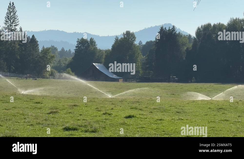 Agricultural Irrigation System - Sprinklers Watering Farmland In Oregon ...