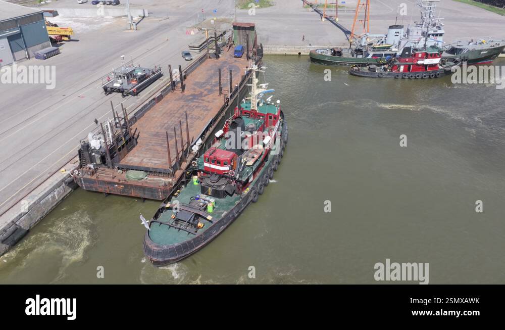 Turku, Finland - 05/28/2024: Idäntie tug boat AJAX manoeuvring in port Stock Video Footage - Alamy