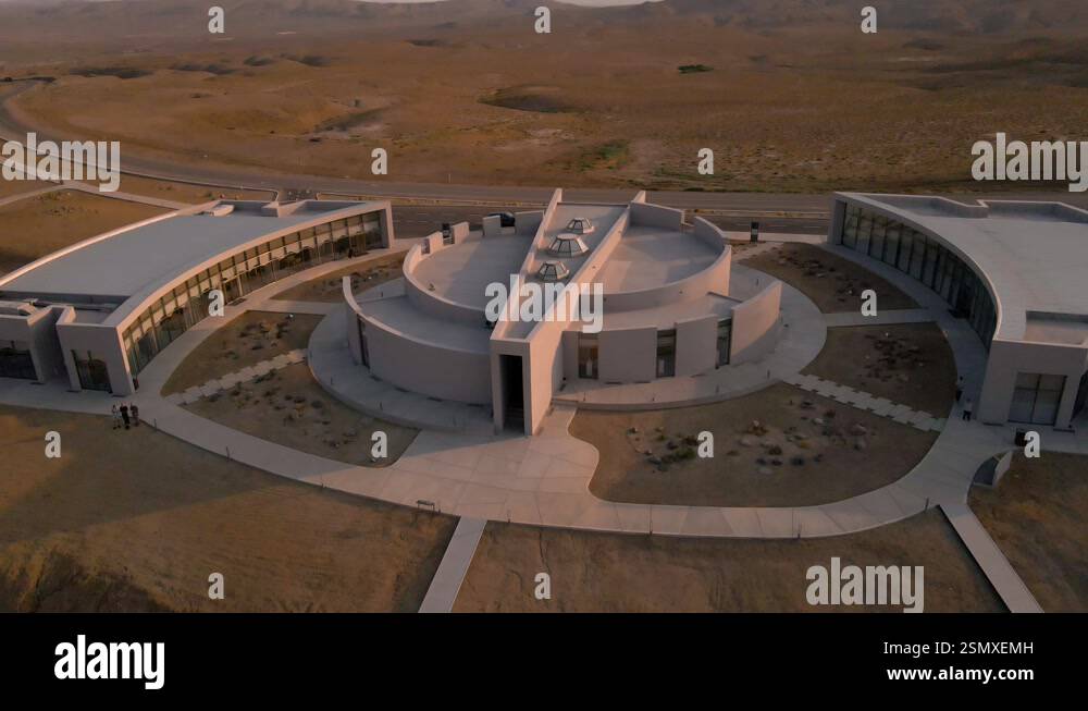 Drone shot ascending while keeping the Mud Volcanoes Tourism Complex in ...