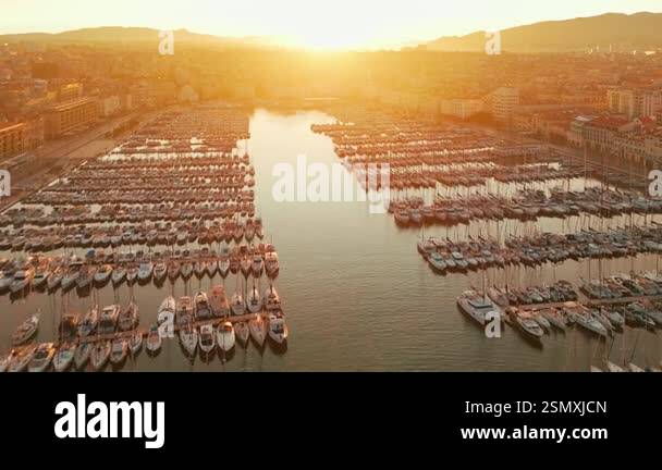 Aerial view of the historic Vieux Port in Marseille at sunrise ...