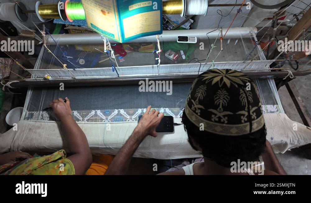Bangladeshi people weaving in a sari factory, Dhaka, Rupganj, Bangladesh Stock Video Footage - Alamy
