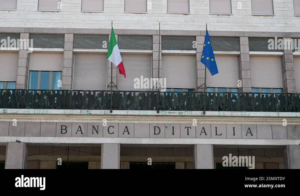 Flag of Italy and European Union. Building of Banka di Italia. Bank ...