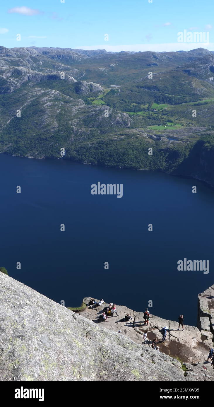Vertical. Overhead panning shot of famous Preikestolen cliff or Pulpit ...
