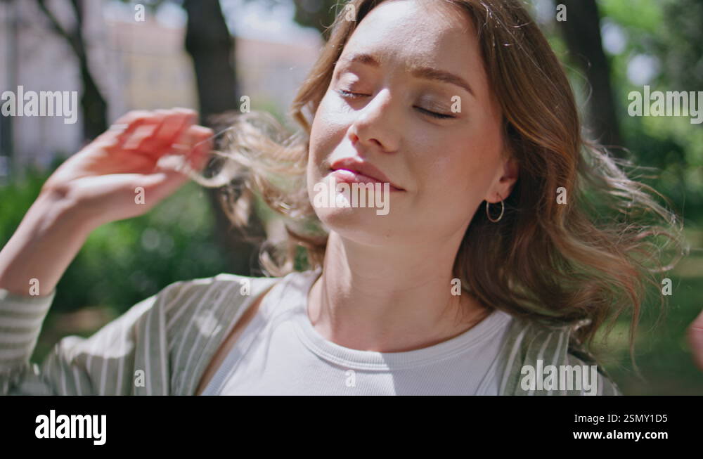 Serene girl relaxing nature bathing beautiful face under summer ...