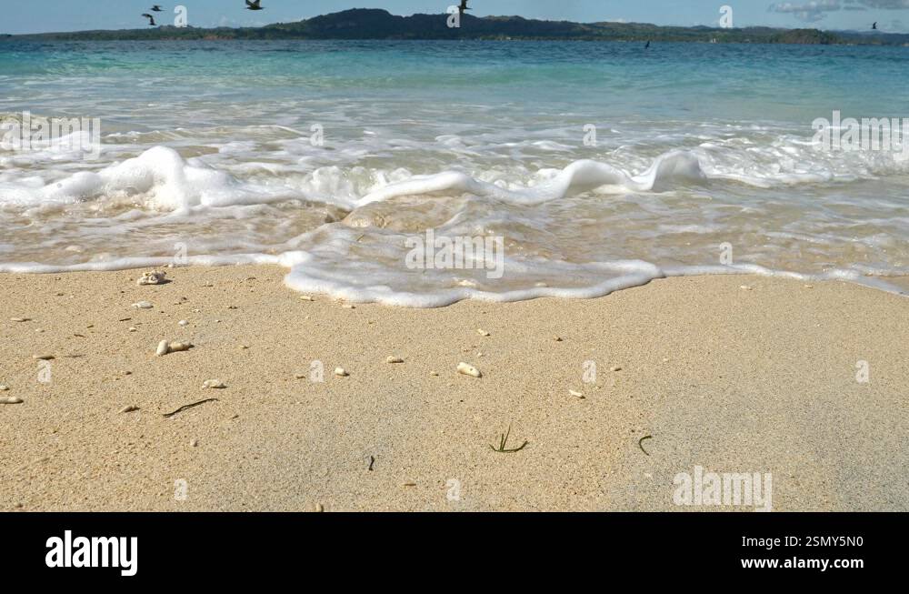Waves on tropical beach slowmotion, Nosy Be, Nosy Fanihy, Madagaskar ...