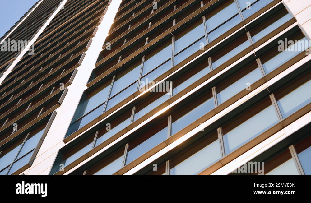 High rise skyscraper facade windows grid dolly shot, financial district ...