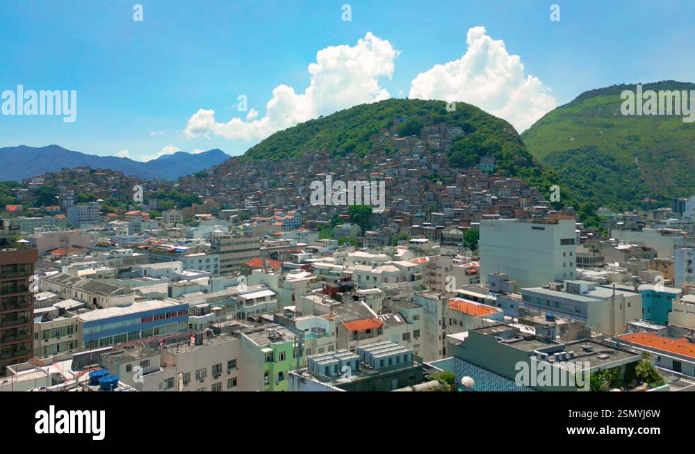 A favela community with colorful buildings in Copacabana, Rio de ...