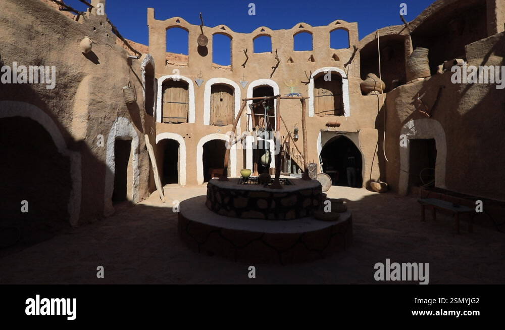 Ancient Tunisian Ksar house with traditional architecture and central ...