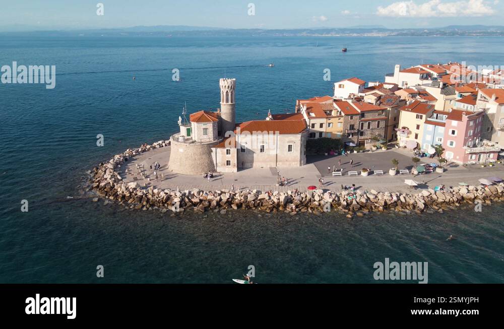 Aerial pan shot capturing old Piran town in Slovenia on a summer ...