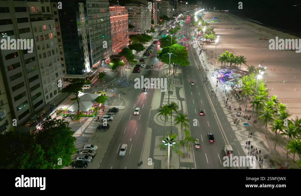 Night view of a busy street along Copacabana Beach in Rio de Janeiro ...