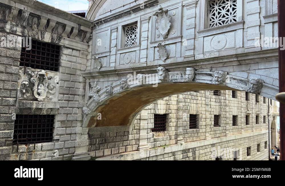 Venice, Italy - 05/15/2024: Pan down view of famous Bridge of Signs in ...