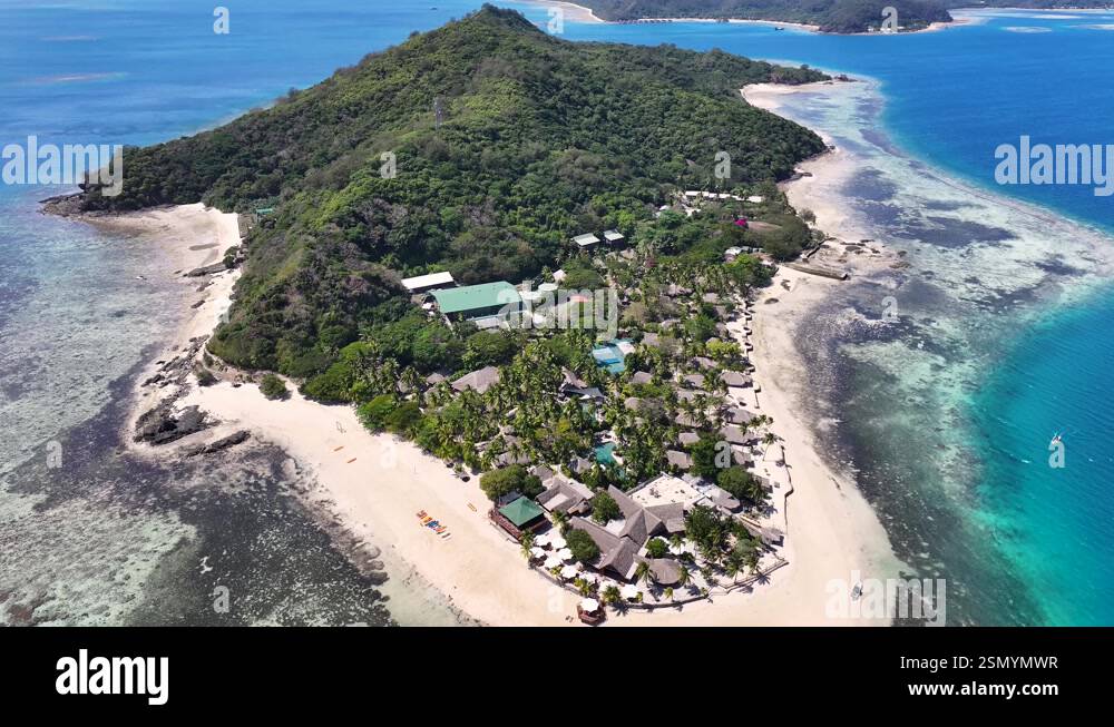 Amazing birds eye view over coral reef and tropical Castaway Island in ...