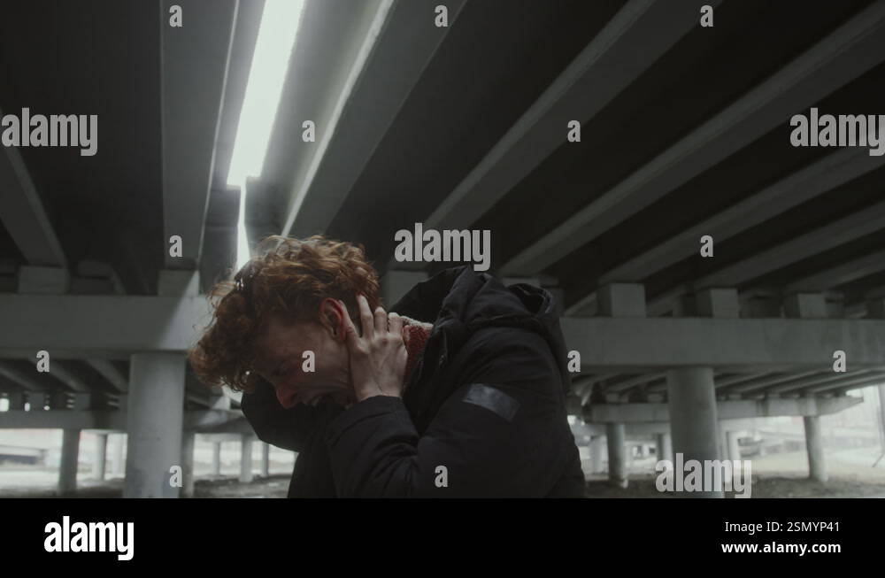 Panicked Young Man Screaming and Touching Face and Neck under Bridge ...