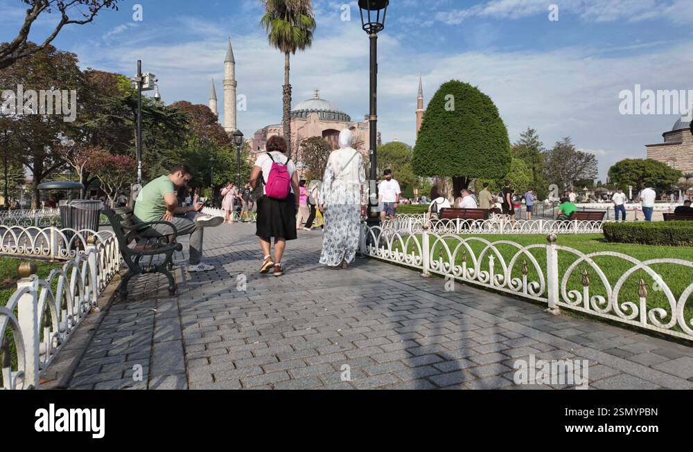 People strolling by the pool in Sultanahmet Square Stock Video Footage ...