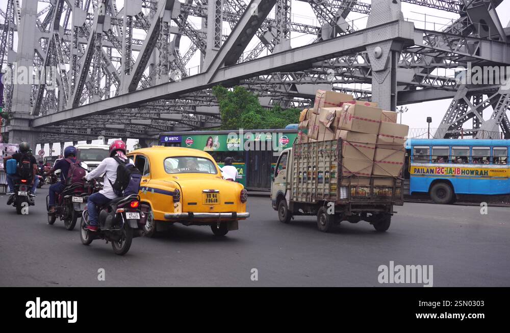 Howrah, India - 09/08/2024: Howrah Bridge is one of the busiest bridges ...