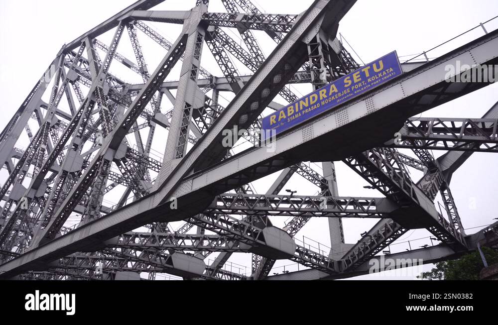 Howrah, India - 09/08/2024: Howrah Bridge is one of the busiest bridges ...