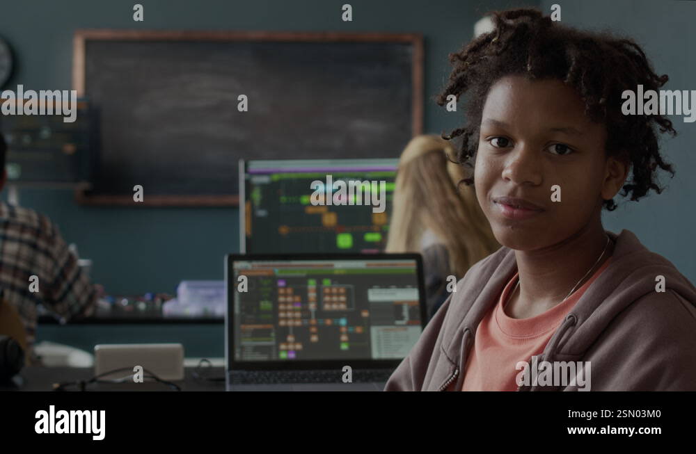 Portrait of African American Gen Z Boy in Programming Class during ...