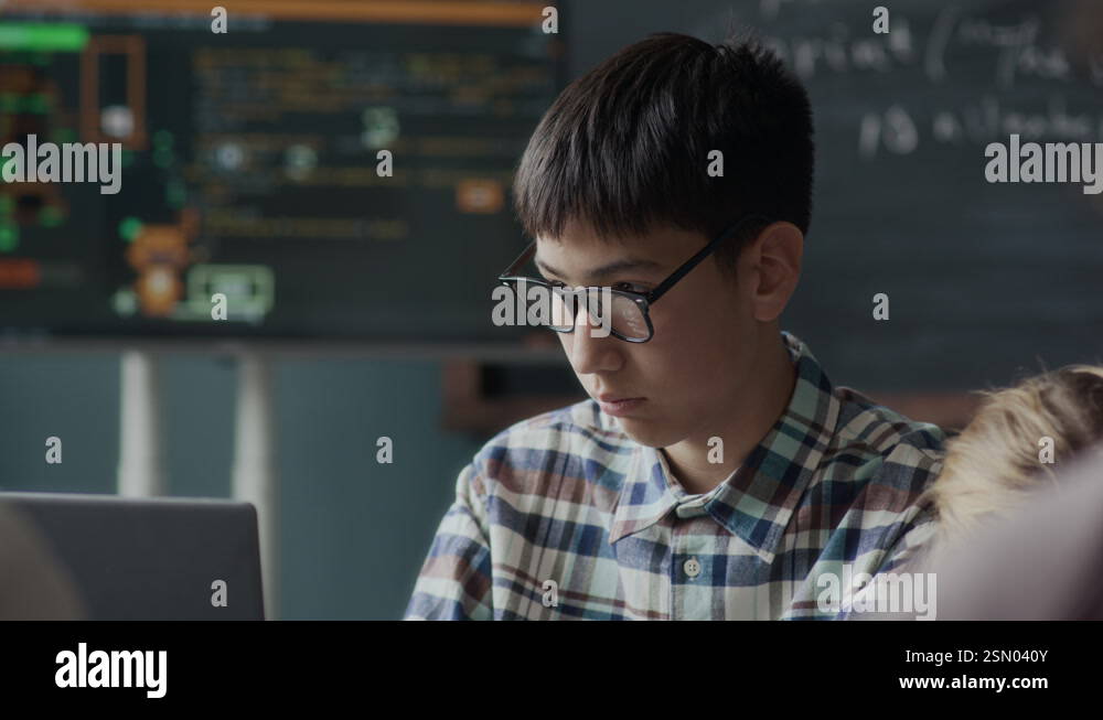 Asian Schoolboy Studying Programming in Class Stock Video Footage - Alamy