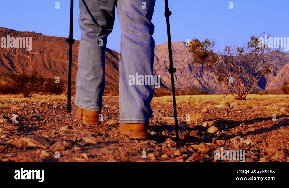 Man walking out for a hike in southwest mountains. Model release ...
