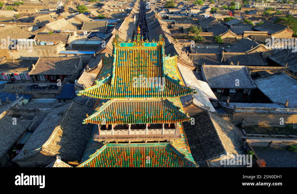 Famous Chinese pagoda in Pingyao ancient town at sunset. Aerial 4K ...