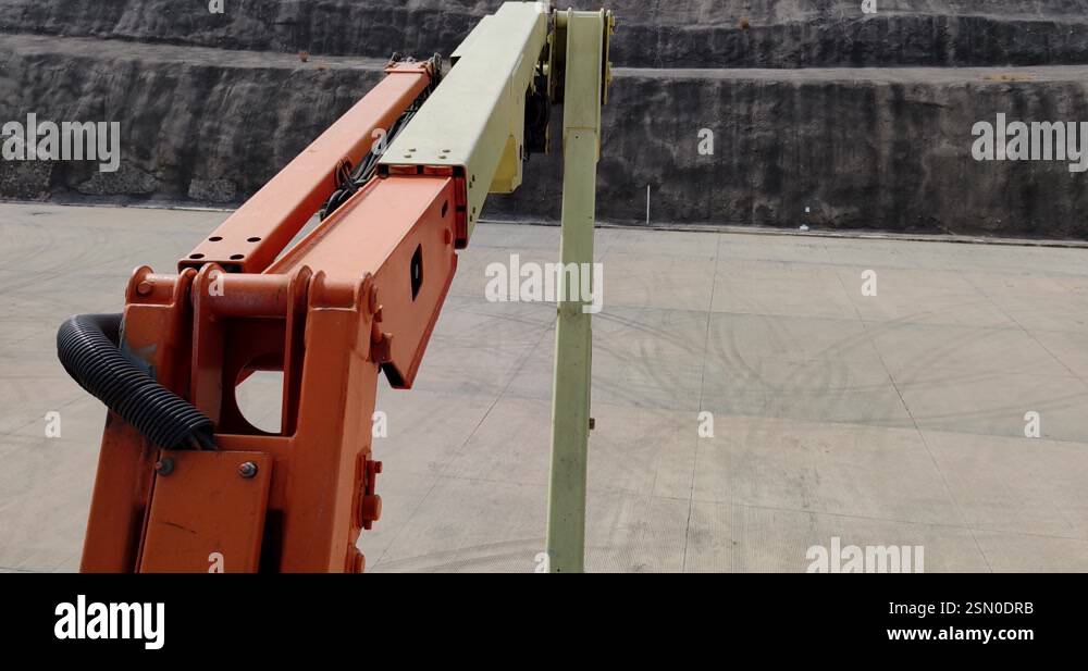 Shot of the operation movement of a crane used in construction to ...