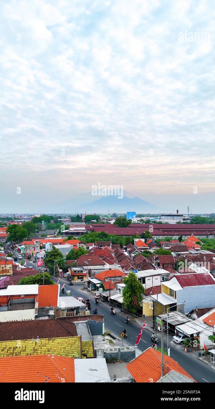 Vertical aerial view of Sidoarjo city with the stunning backdrop of ...