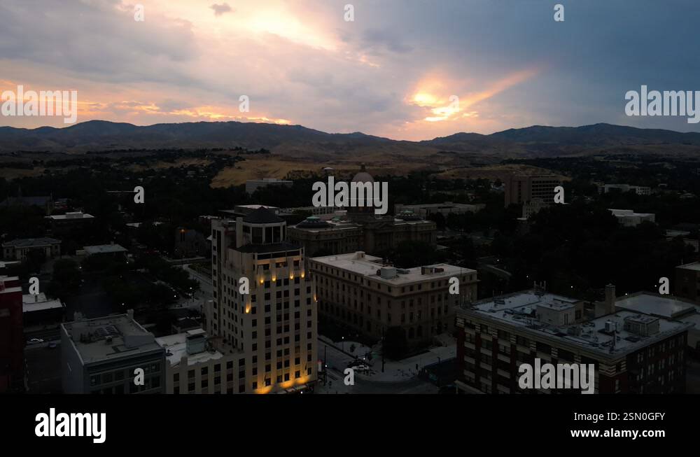Flying the drone behind the Idaho capitol as the sun rises behind the ...