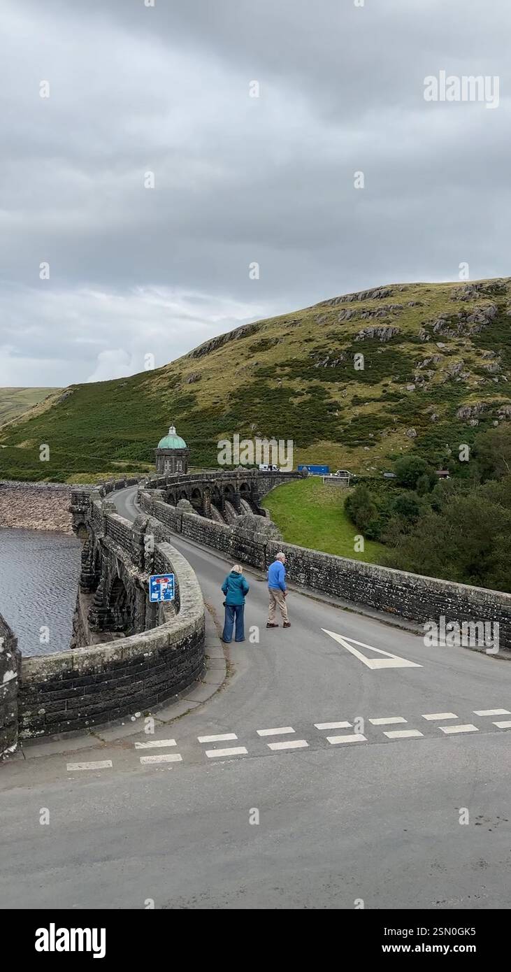 Craig Goch Dam, United Kingdom (UK) - 09/04/2024: An elderly couple ...