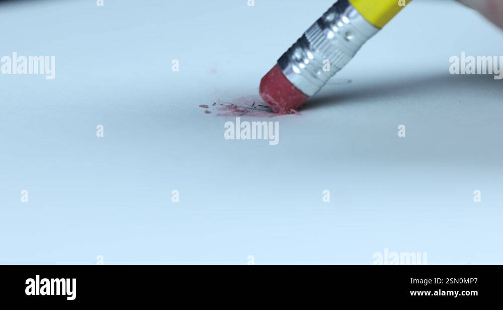 pencil and eraser, easing words on paper Stock Video Footage - Alamy
