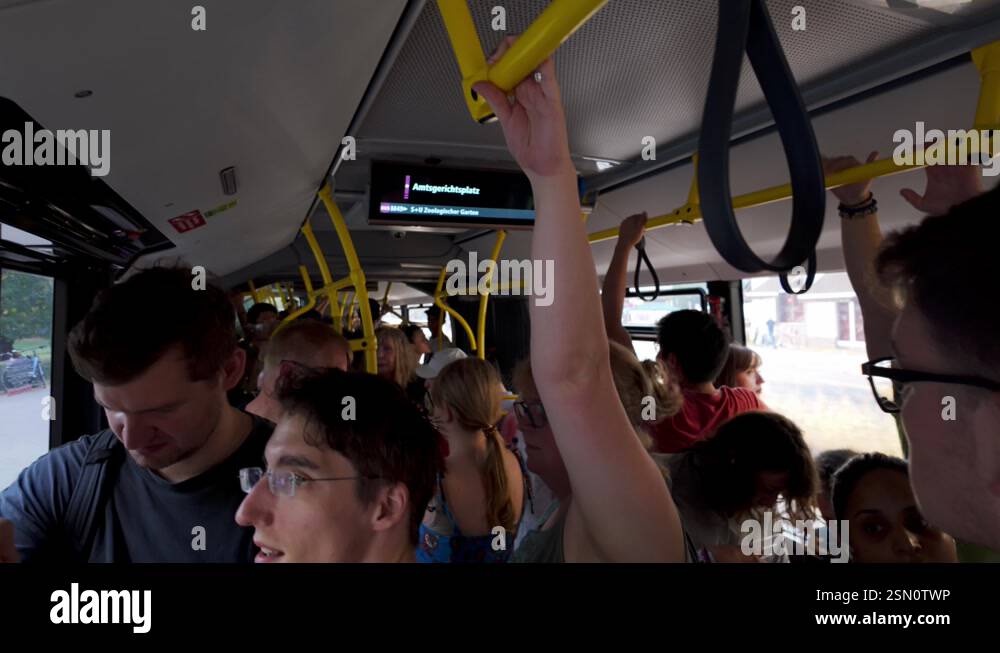 Berlin, Germany - 09/12/2024: Crowded scene inside an electric bus in ...