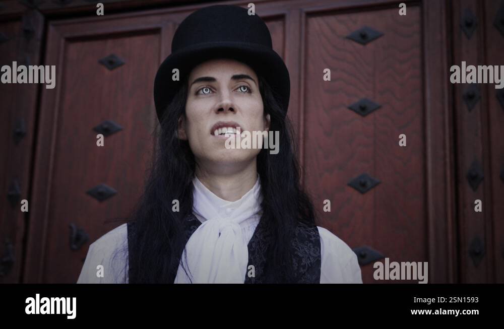 handsome and mysterious gothic vampire with long black hair walking ...