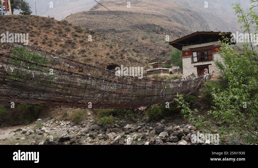 Tachog Lhakhang monastery with prayer flags, Wangchang Gewog, Paro ...