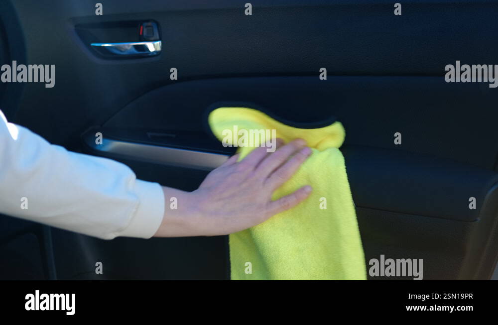Girl driver wipe cabin with rag Stock Video Footage - Alamy