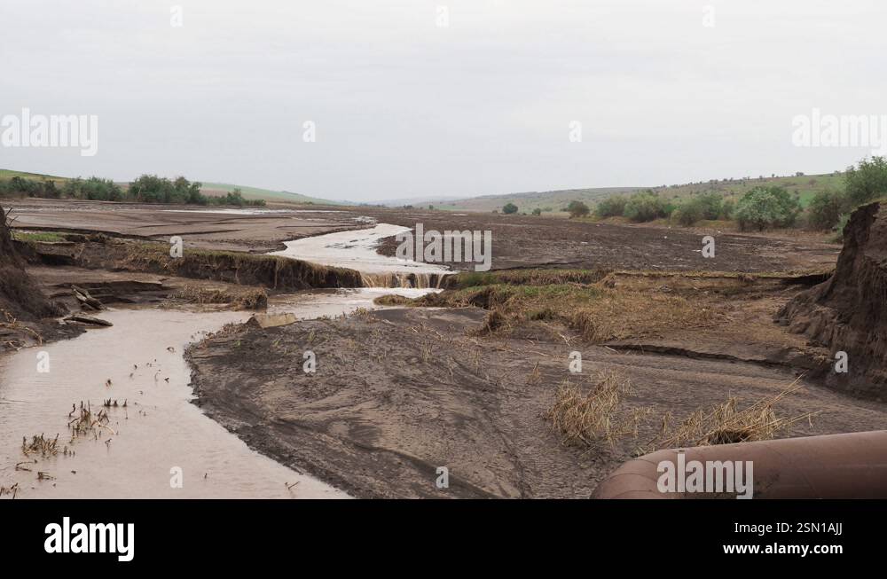 Earth dam damaged by floods caused by Storm Boris in Galati, Cudalbi ...