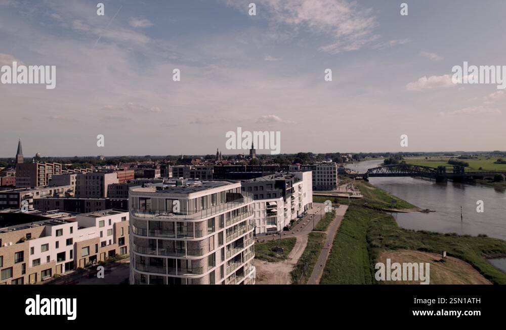 High rise apartment buildings rising up at the riverbed in Noorderhaven ...